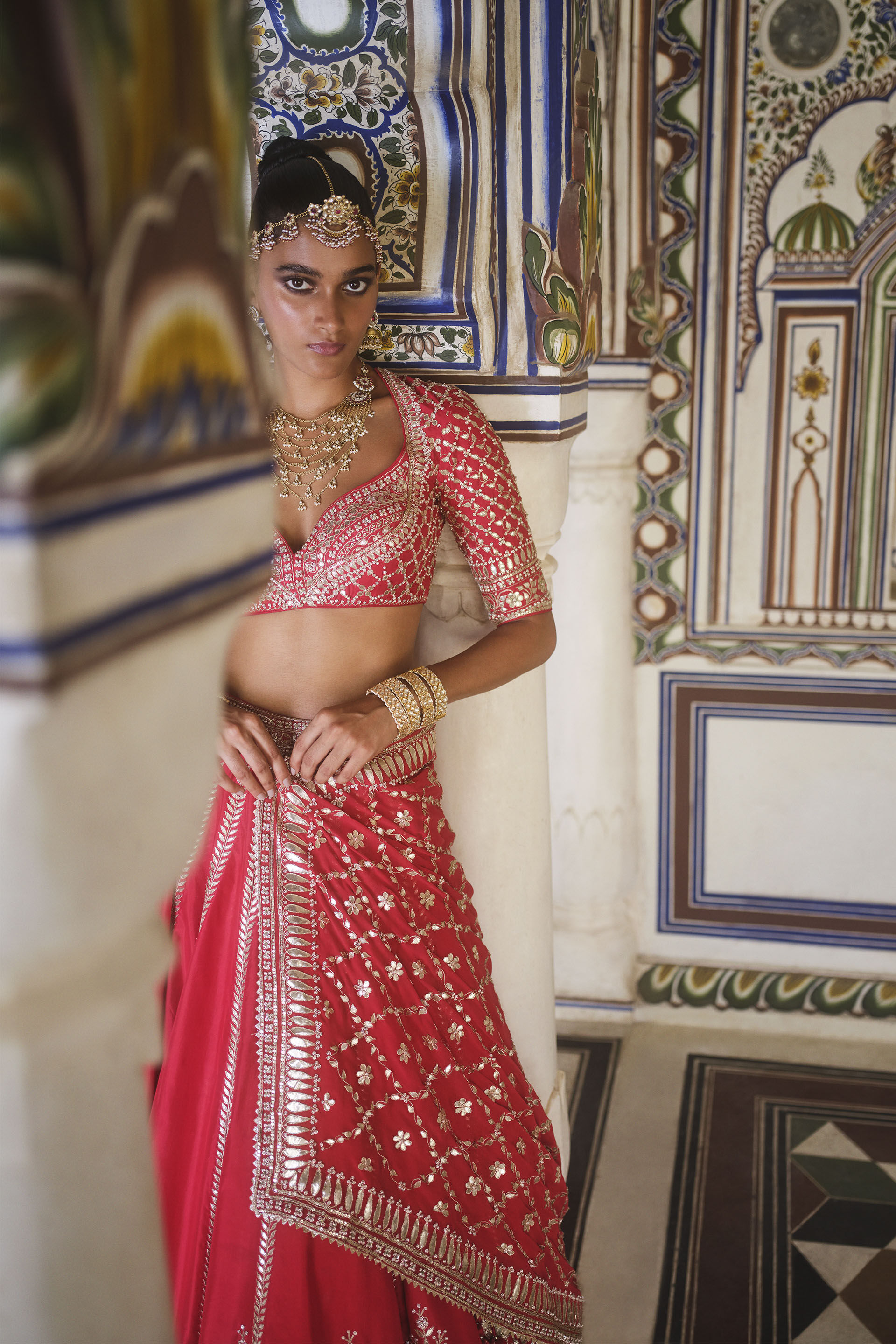Red lehenga with red jewellery store